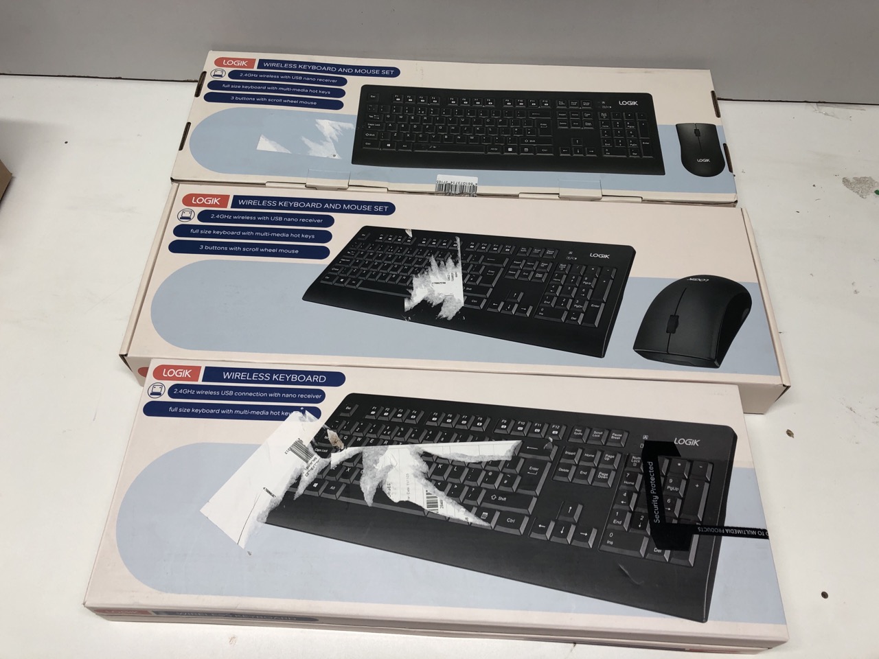 John Pye Auctions - A BOX OF KEYBOARDS AND HEADSETS ETC